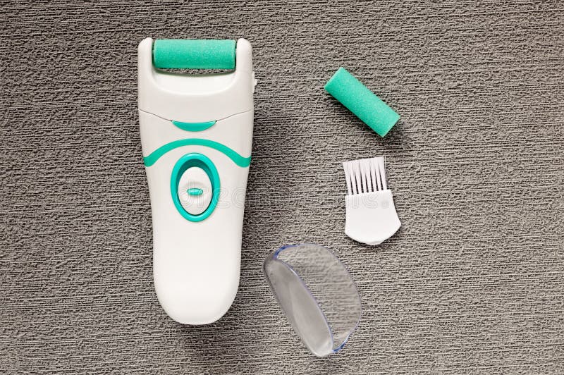 Electric Foot Scrubber Being Used in Pedicure Stock Photo - Image of ...