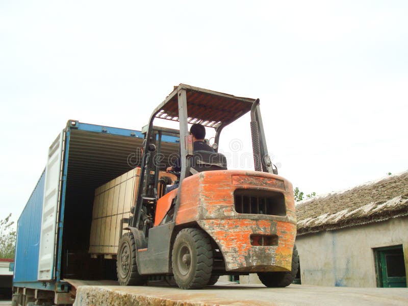 Forklift loading beer kegs stock photo. Image of loader - 32482802