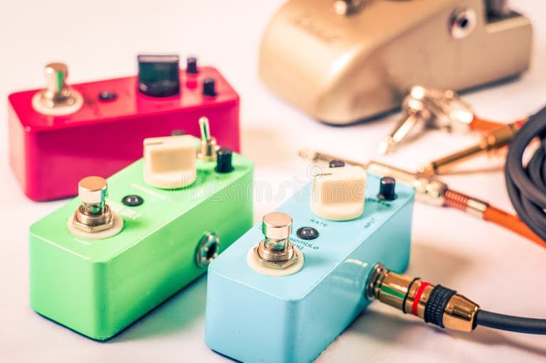 Electric Guitar Stomp Effectors and Cables in Studio. Focus is on ...