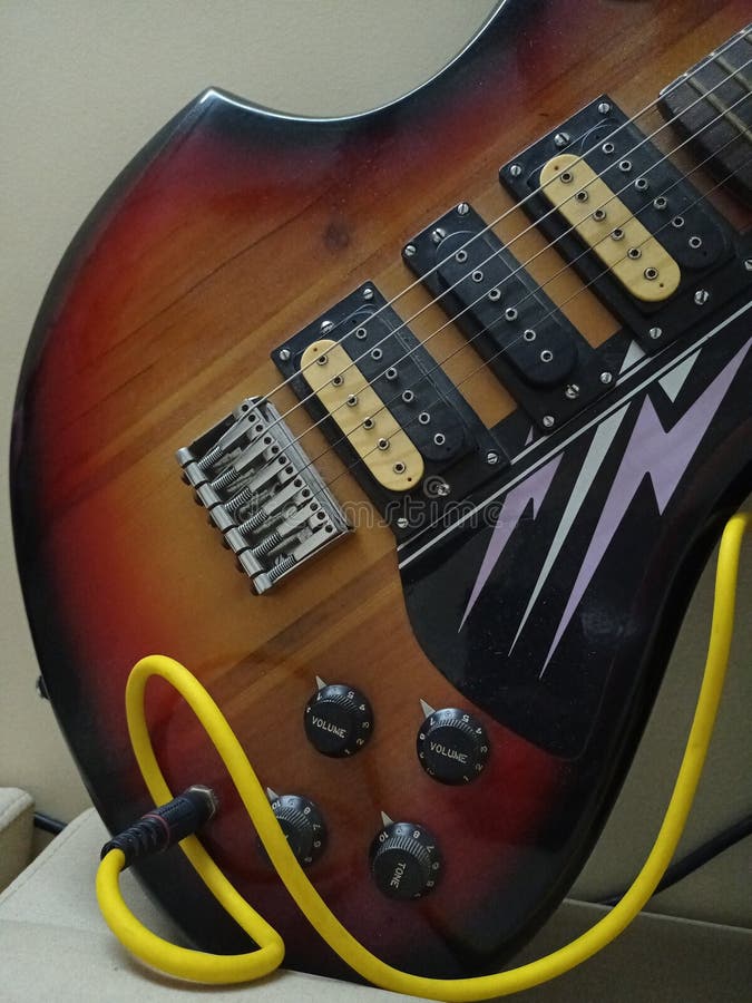 Electric Guitar with Yellow Colour Cable Closeup View Stock Photo - Image of bassist, guitar ...