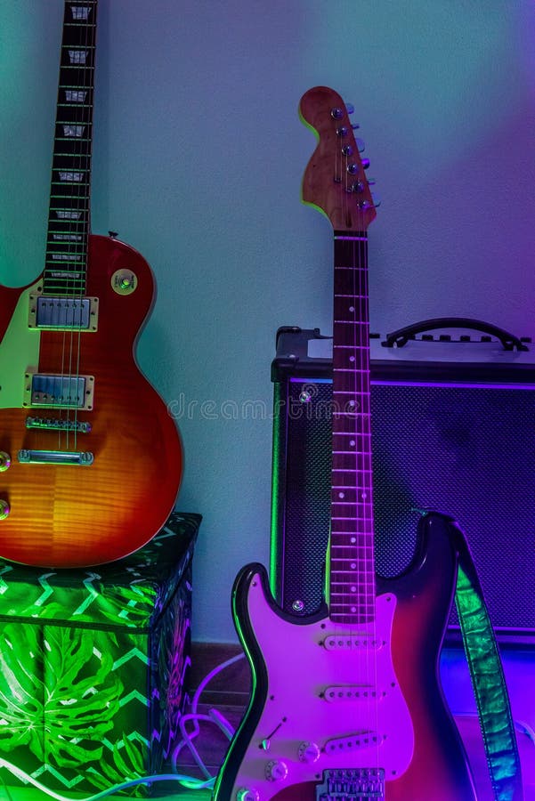 Electric Guitars and Amplifier Aganist a Wall Stock Photo - Image of ...