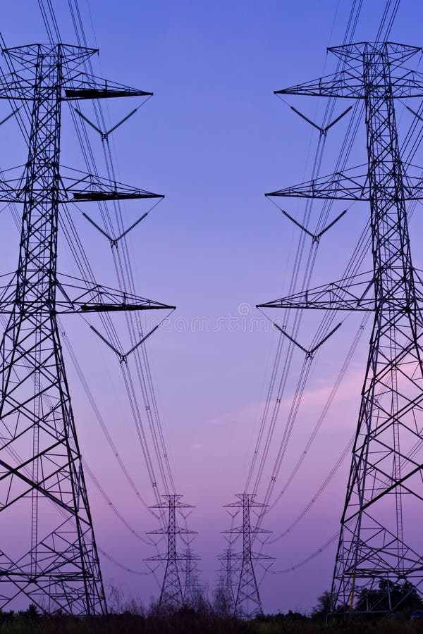 Electric AC Grid High Voltage Transmission Towers Stock Photo - Image ...