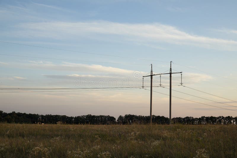 Electric High Voltage Power Post in the Field Stock Photo - Image of ...
