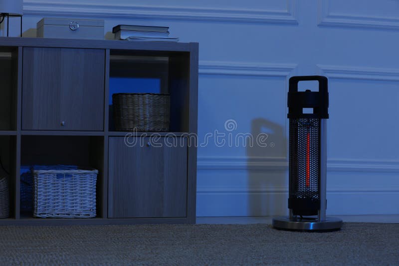 Electric Infrared Heater in Dark Room Stock Photo - Image of appliance ...