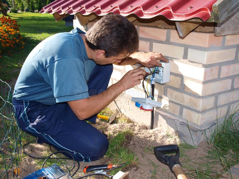 Confused Electrician Looking at Fuse Box Stock Image - Image of male ...