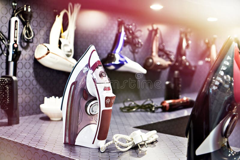 Electric Iron on Shop Window Stock Image - Image of retail, steel ...