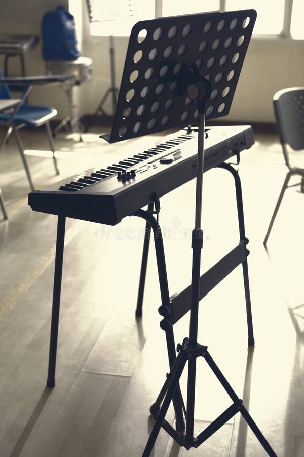 Keyboard and note stand stock image. Image of music - 132763201