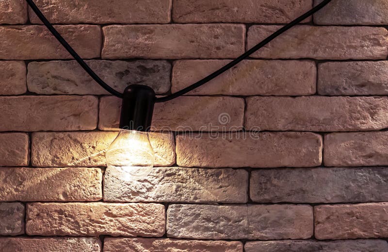 Electric Lamp on a Brick Wall Background. Loft Style Interior Stock ...