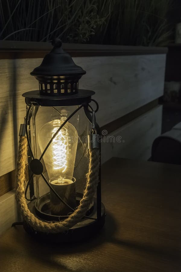 Electric Lantern in a Bar Table with Rope Handle. Shadow and Light ...