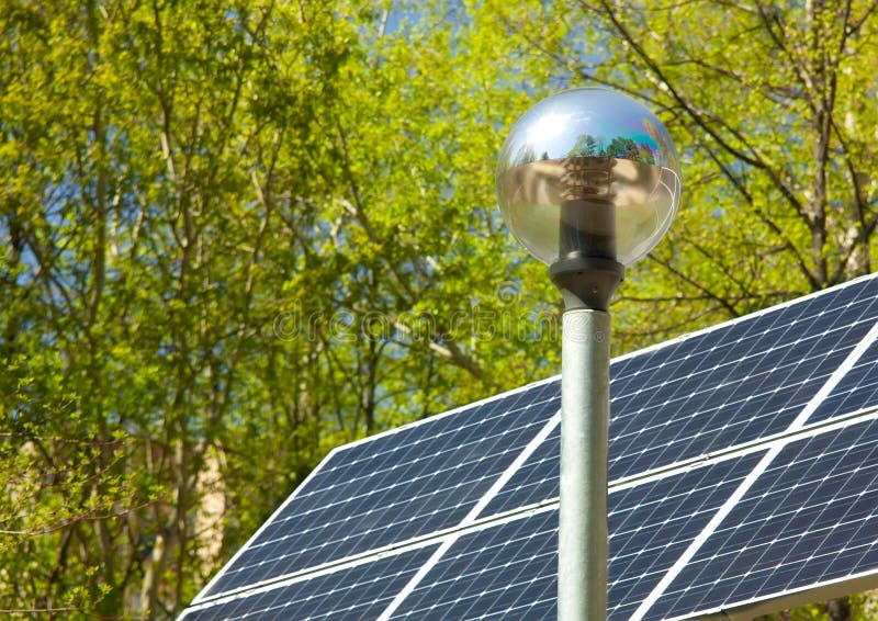 Electric Lantern and Solar Panel Stock Photo - Image of blue ...