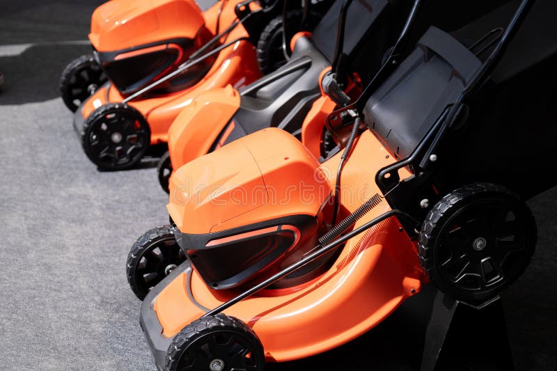Electric Lawn Mowers in a Row. Stock Image - Image of grass, modern ...