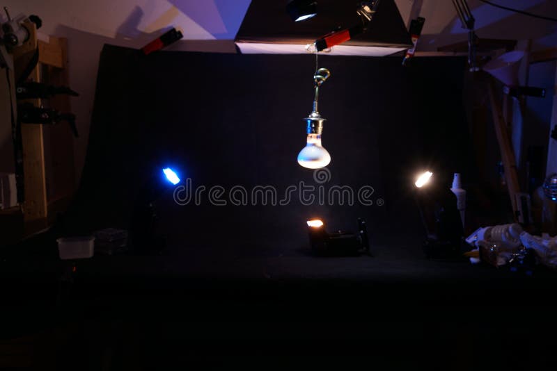 Electric Light Bulb and Flashlights in the Darkness Stock Image - Image ...
