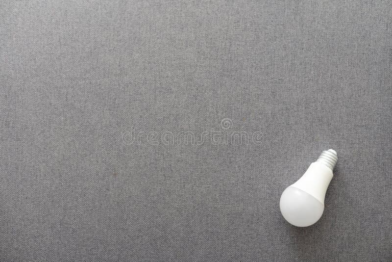 Electric Light Bulb on a Gray Background. Stock Image - Image of ...