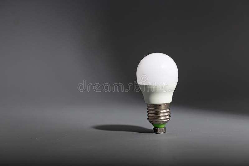 Electric Light Bulb on a Gray Background Stock Image - Image of glass ...
