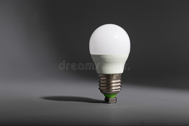 Electric Light Bulb on a Gray Background Stock Photo - Image of bulb ...