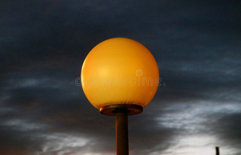 Electric Light Bulb and Sun at Beach Sunset Sky, Milan Italy Stock ...