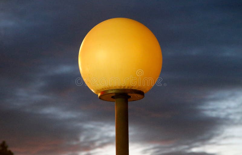 Electric Light Bulb and Sun at Beach Sunset Sky, Milan Italy Stock ...