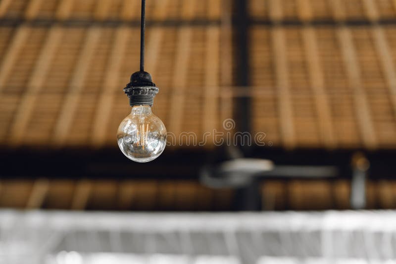 Electric Light Bulb on a Wire an Electric Light Bulb Isolated Against ...