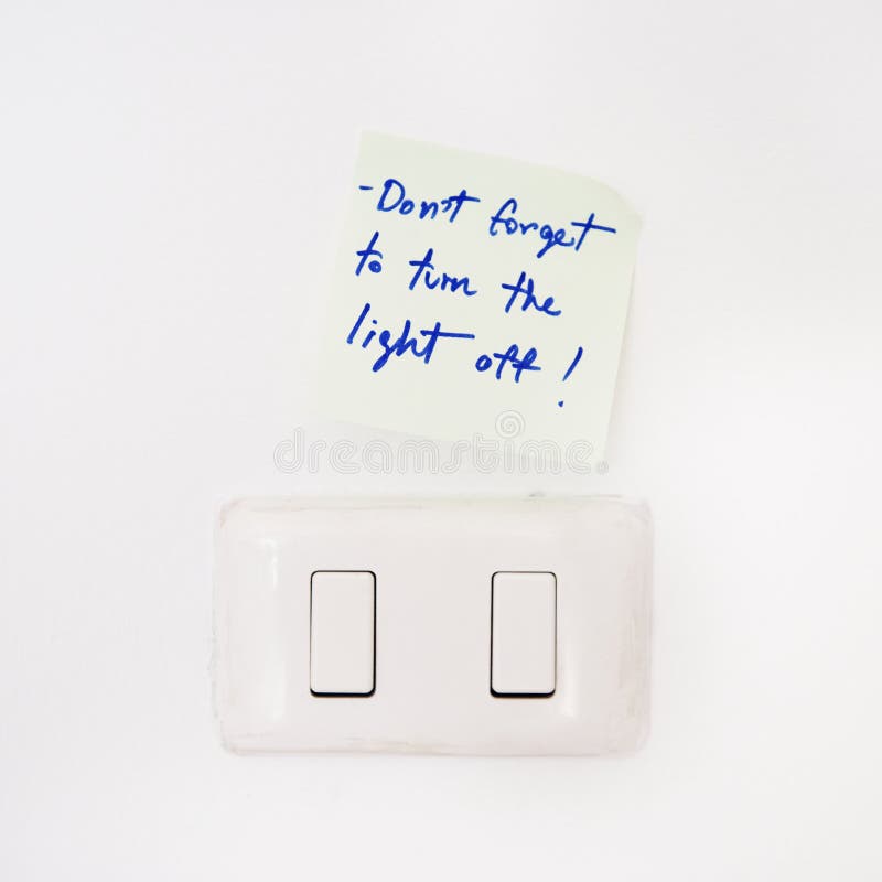 Electric Light Switch with Reminder Note on White Wall Stock Image ...