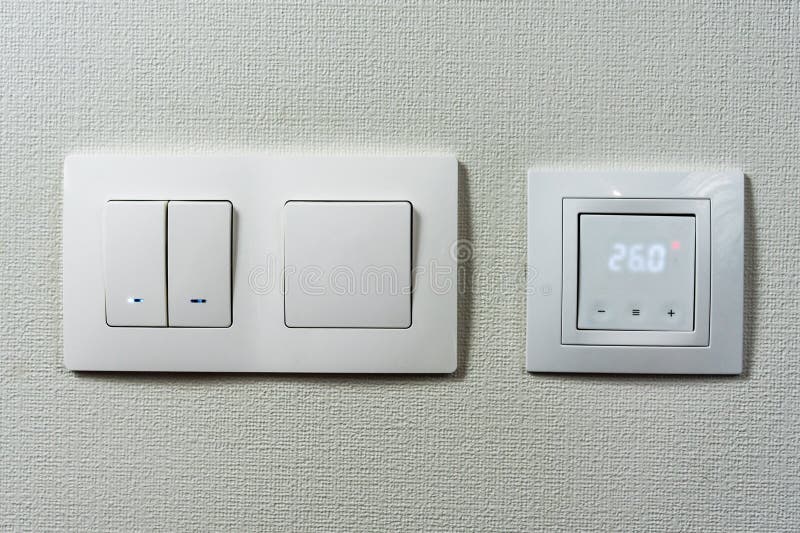 Electric Light Switch and Socket on the Empty Wall, Electrical Power ...