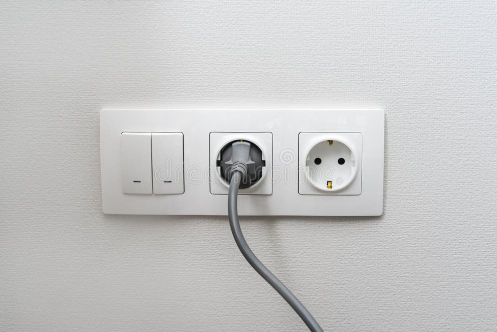 Electric Light Switch and Socket on the Empty Wall, Electrical Power ...