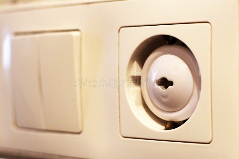 Electric Light Switch and Socket on the Empty Wall, Electrical Power ...