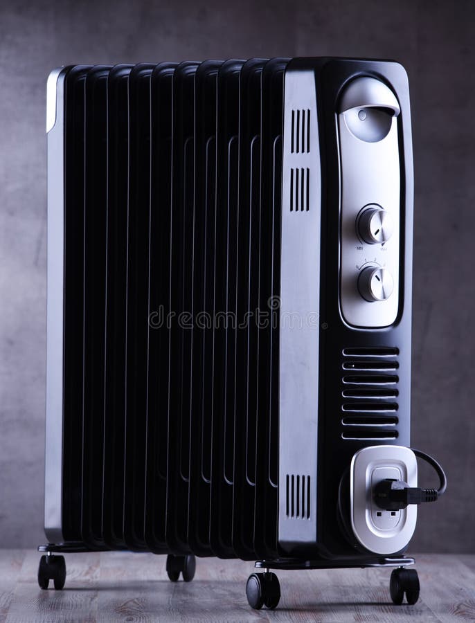 Electric Liquid-filled Oil Heater for Home Use Stock Photo - Image of ...