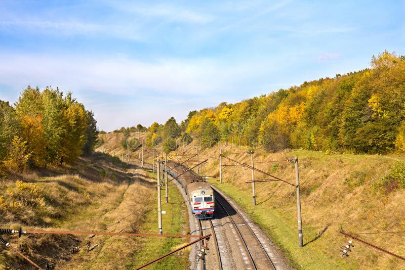 Electric Mainline Railroad in Autumn Forest Editorial Photo - Image of ...
