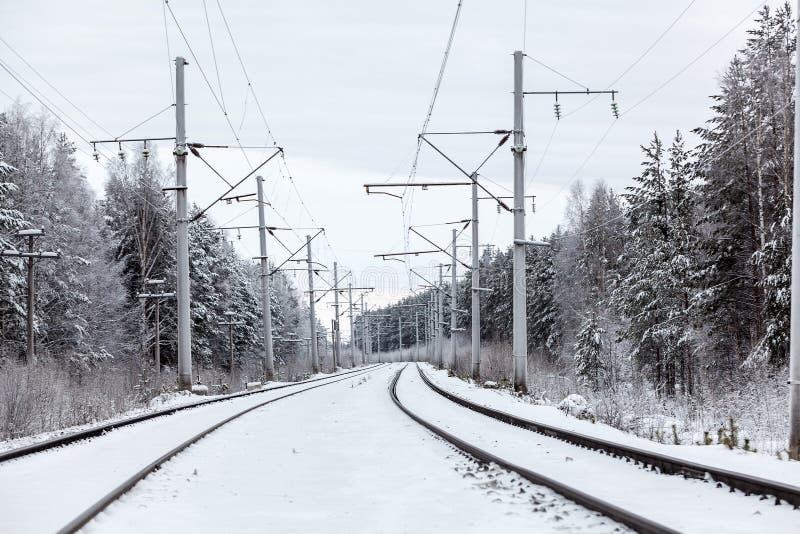 Electric Mainline Railroad in Winter Forest Stock Photo - Image of ...
