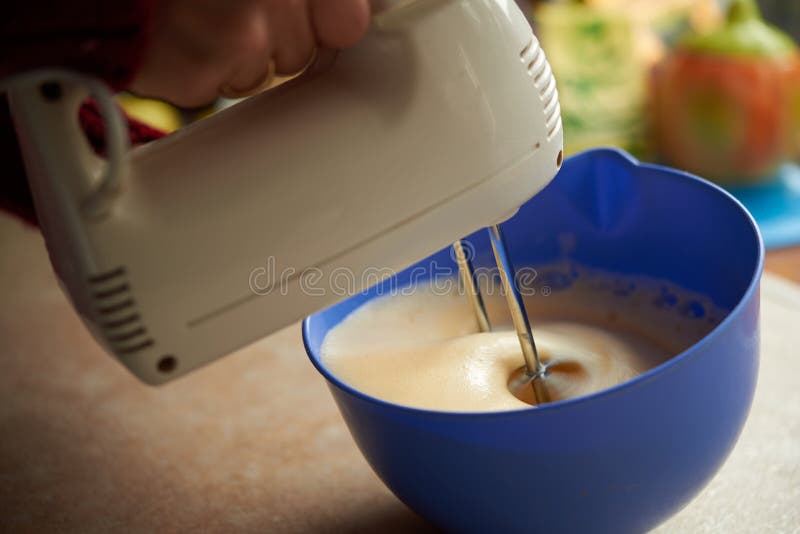 Electric mixer beats egg stock photo. Image of blender - 78158180