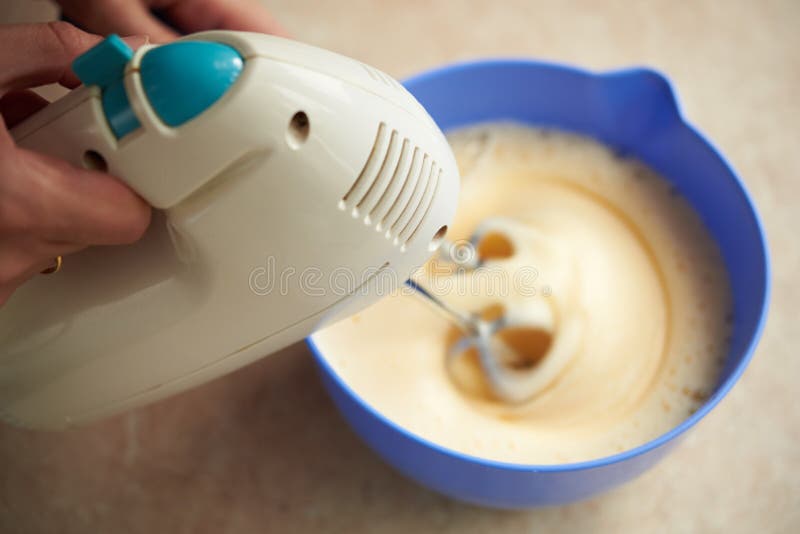 Electric mixer beats egg stock photo. Image of bowl, kitchen - 78158186