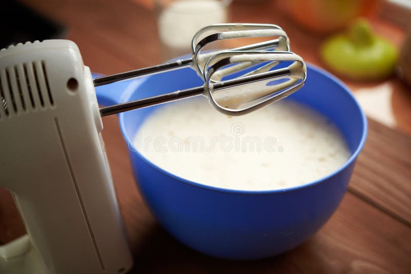 Electric mixer beats egg stock photo. Image of homemade - 81922684