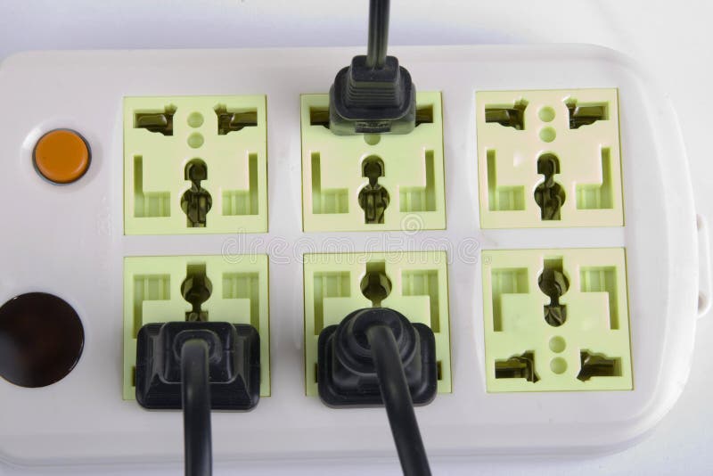 Plugs in electrical outlet stock image. Image of plugged - 4422333