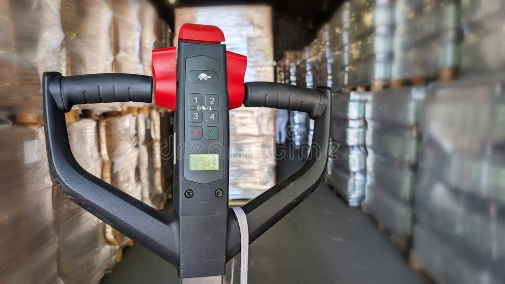 Electric Pallet Jack with Control Panel in a Warehouse, Surrounded by ...