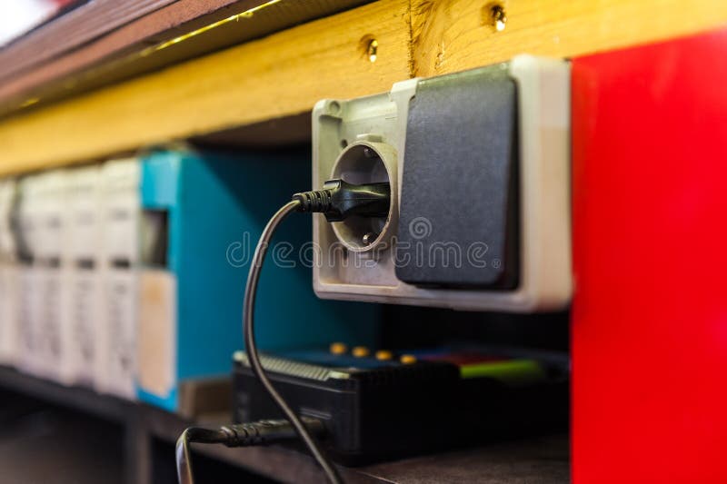 Electric Plug Hanging from Ceiling in Workshop Stock Image - Image of ...