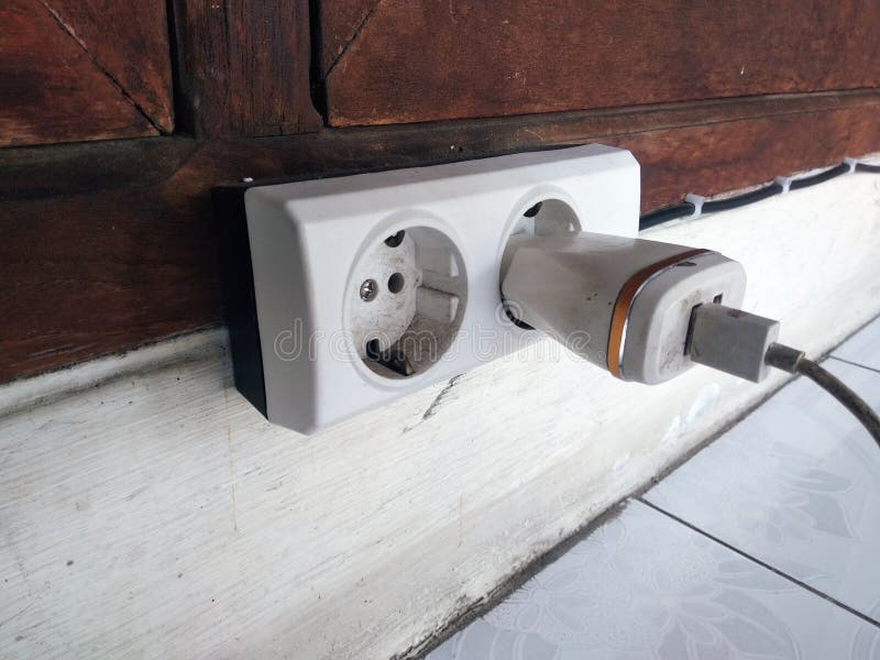 Electric Plug on House Wall Stock Image - Image of efficient, incorrect ...