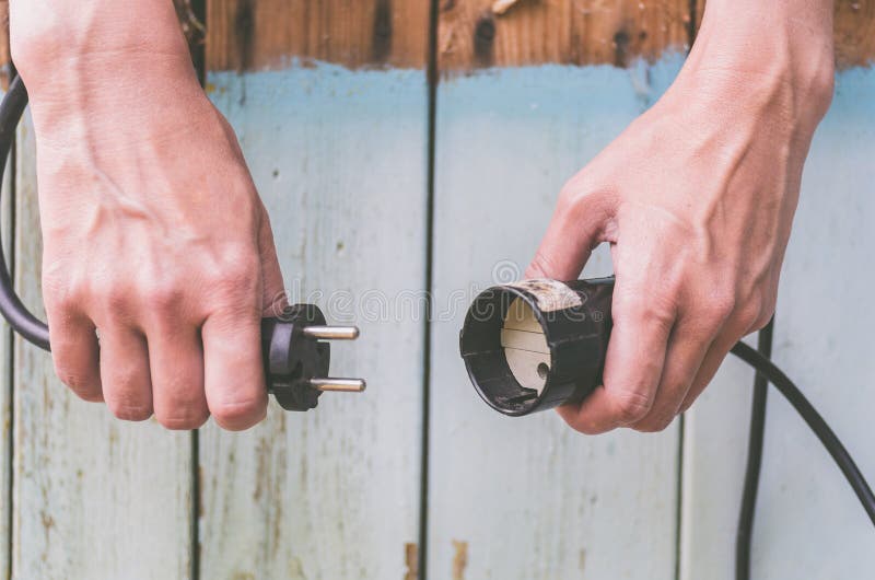 Electric Plug with an Open Socket in Hand Stock Image - Image of ...