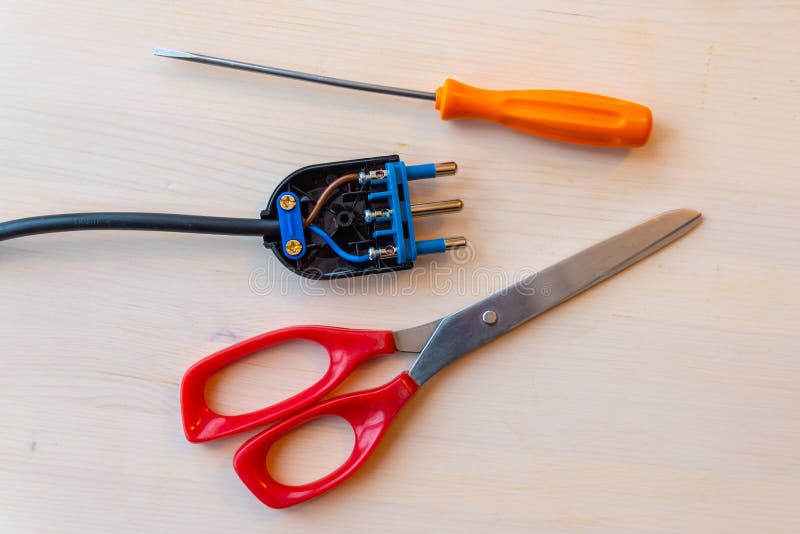 Electric Plug, Screwdriver and Scissors Stock Photo - Image of safety ...