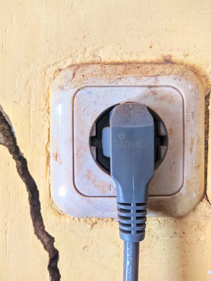 Electric plug in the wall stock photo. Image of drawing - 341993704