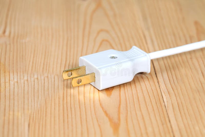 Electric plug on wooden stock image. Image of connect - 79568359