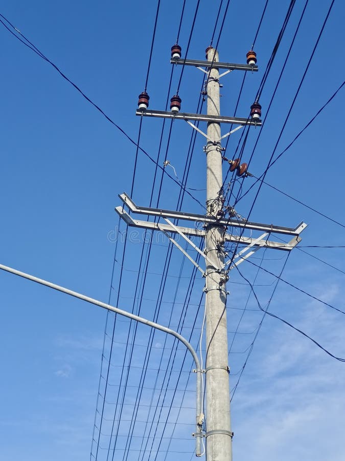 Electric Pole and Cable stock photo. Image of fence - 266159978