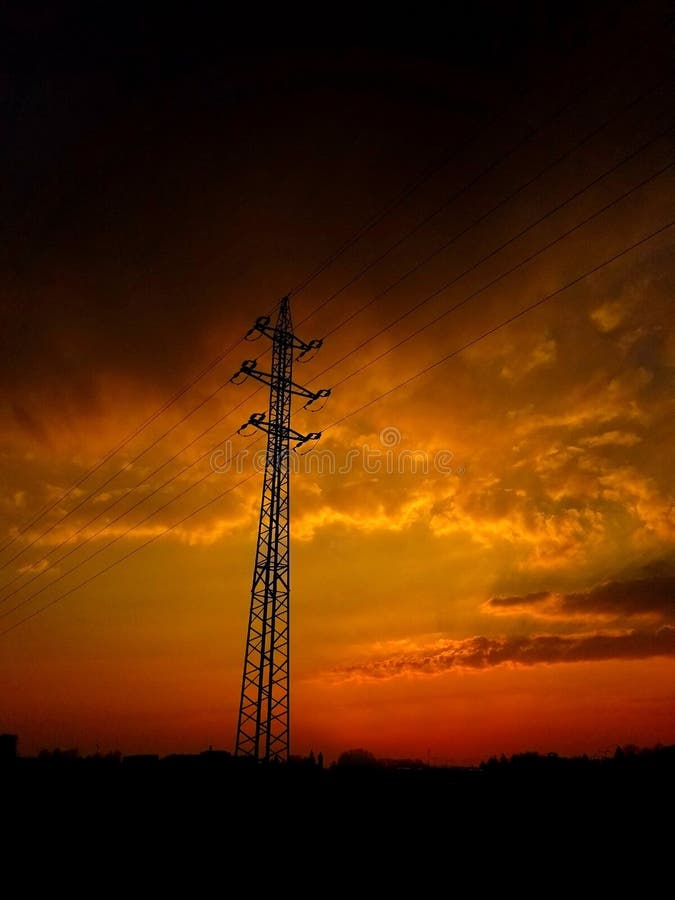 Electric Pole and Electric Cable on the Field in the Countryside in ...