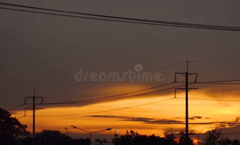 Electric Pole and Cable Line on Twilight Sky in Sunset Stock Image ...