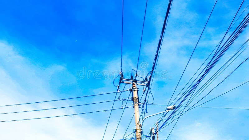 Electric Pole with Cables Under Blue Sky Stock Image - Image of lines ...