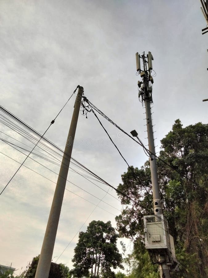 The Electric Pole and the Transmitter Pole are Too Close Stock Image ...