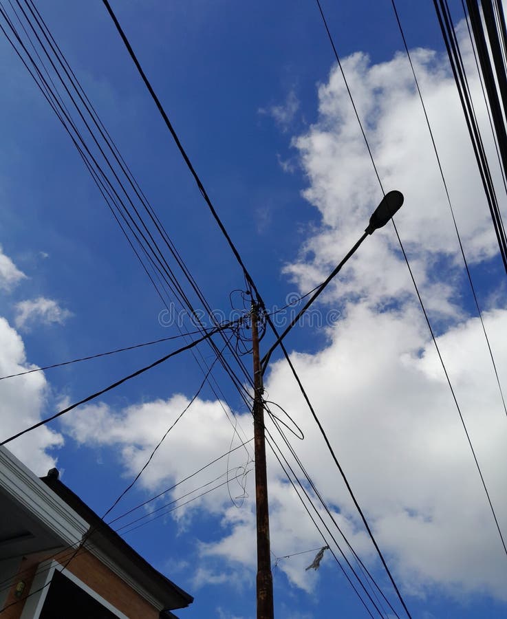 Electric Pole Under Sunny Clouds Stock Image - Image of clouds ...