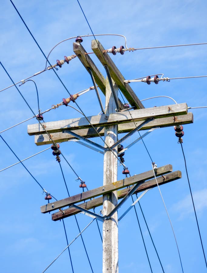 Electric Pole and Wires, Wood Electricty Pole on Blue Sky Background ...