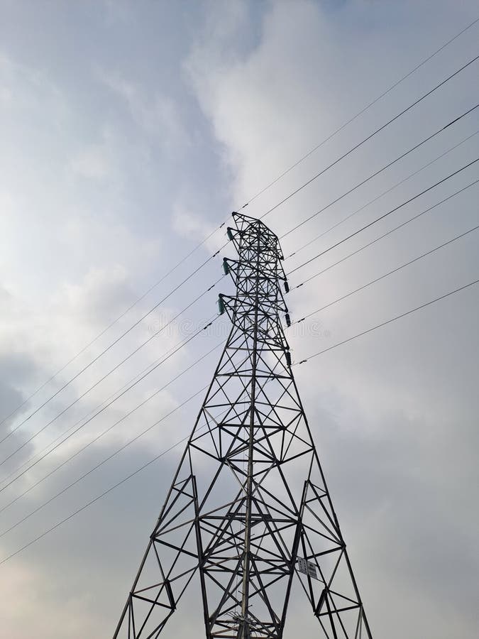 Electric Poles with Straight Wires in Line on a Cloudy Sky Stock Image ...