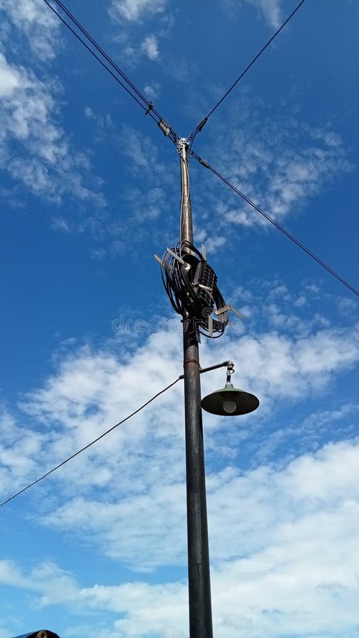 Electric Poles and Street Lights Stock Photo - Image of poles ...