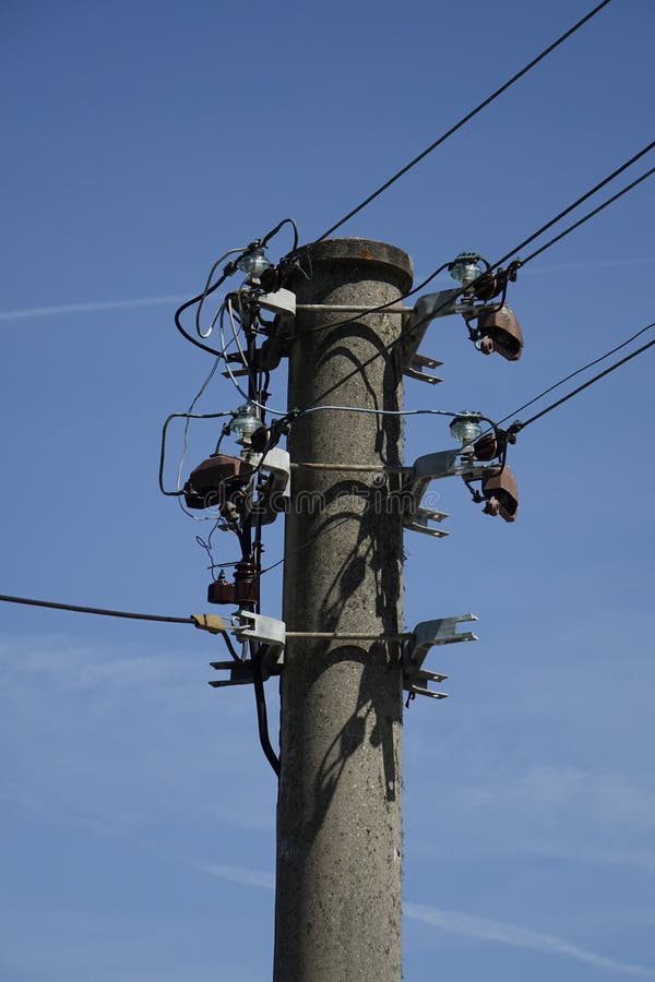 Electric Post with Wire and a Blue Sky Background Stock Image - Image ...